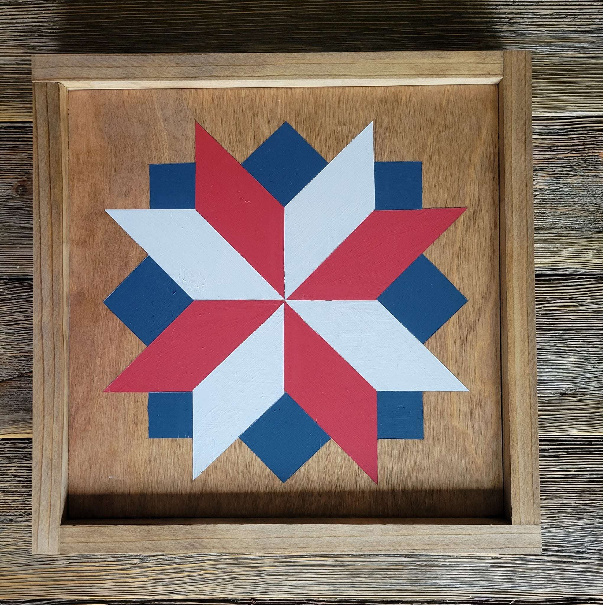 Red star barn quilt with red triangle shapes - The Best Quilt Patterns